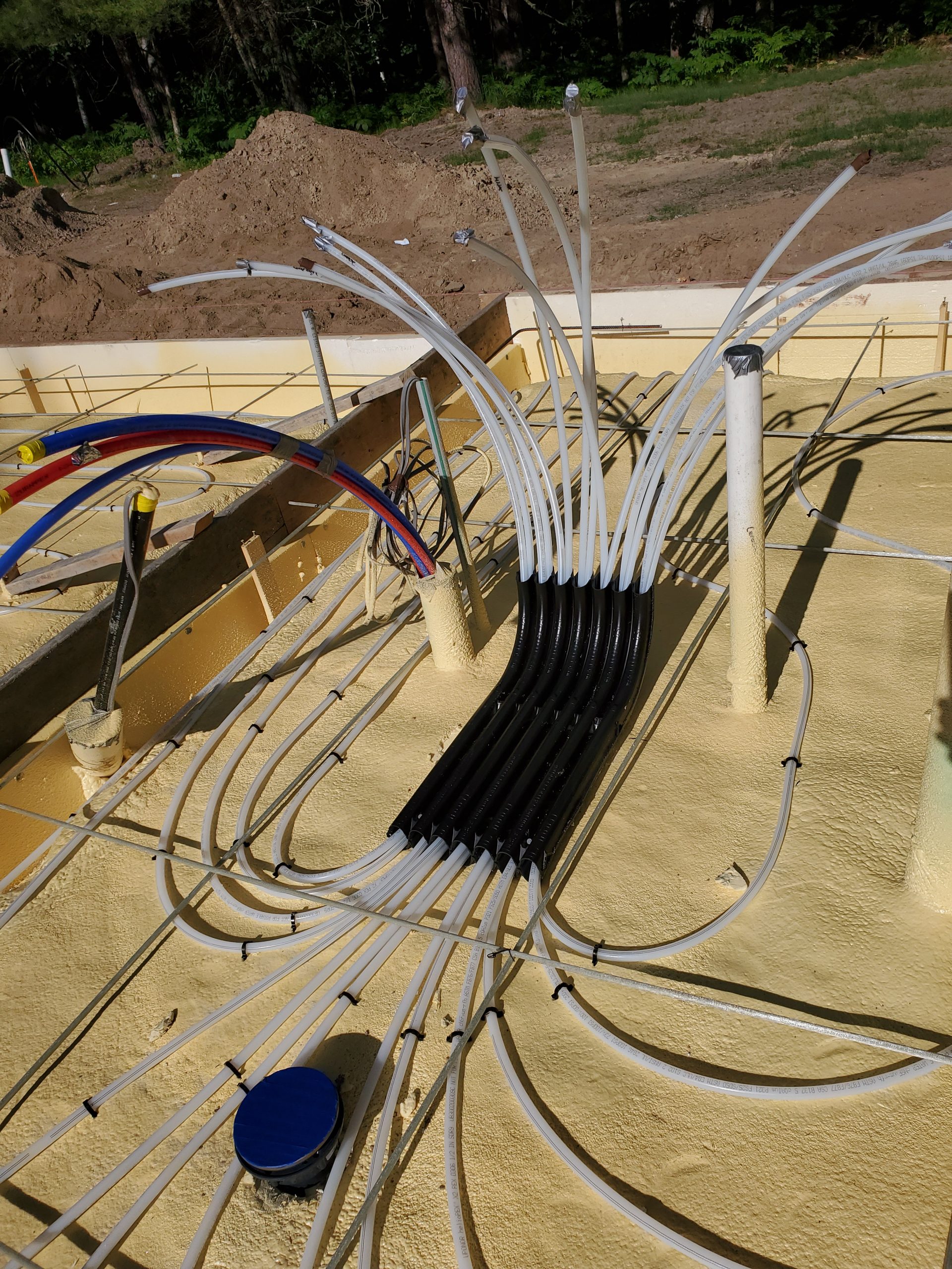 Construction Design-Closed Cell Spray Foam Below a Slab - Northern Built