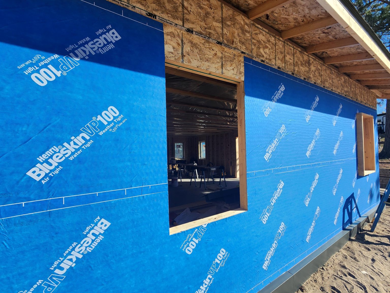 How to Integrate a Window into a Water Resistive Barrier - Northern Built